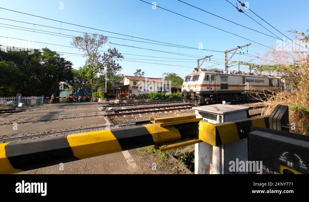 Train crossing road india Stock Videos & Footage - HD and 4K Video ...