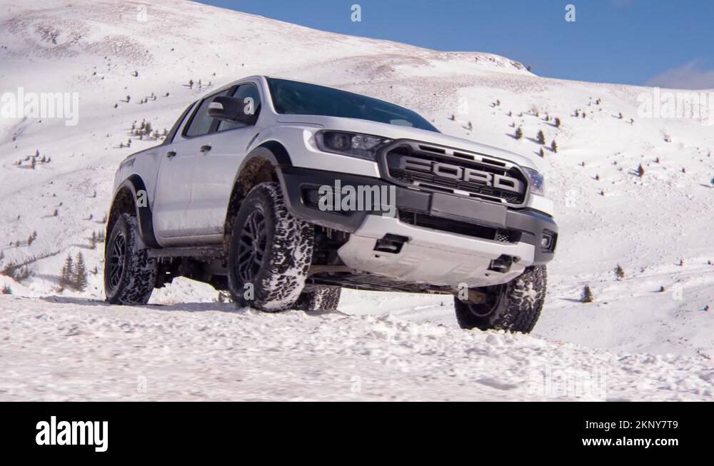 Ford Ranger Raptor SUV pickup truck parked on the mountain top during ...