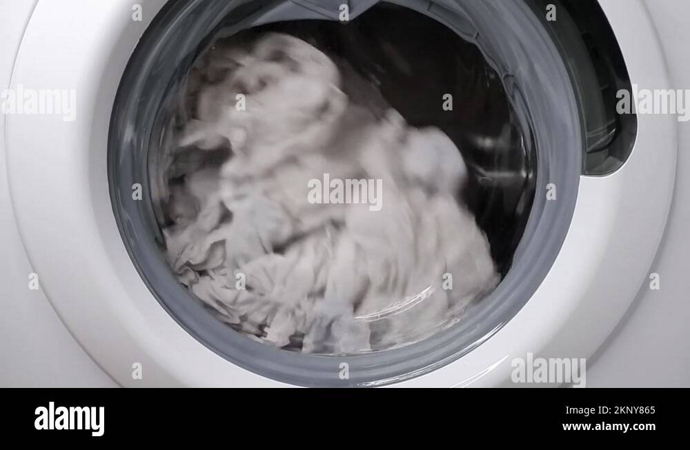 Washing clothes in a washing machine. Slow motion Stock Video Footage ...
