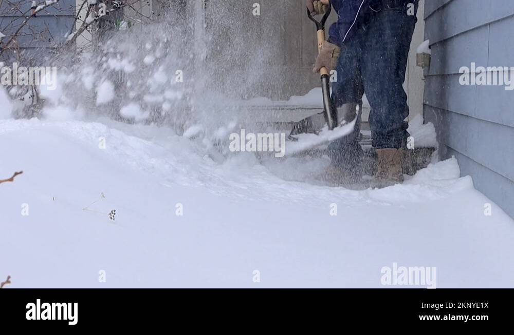 Clearing the pathway of snow Stock Videos & Footage - HD and 4K Video ...