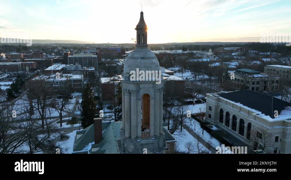 Higher education in America. Winter snow scene of college university ...
