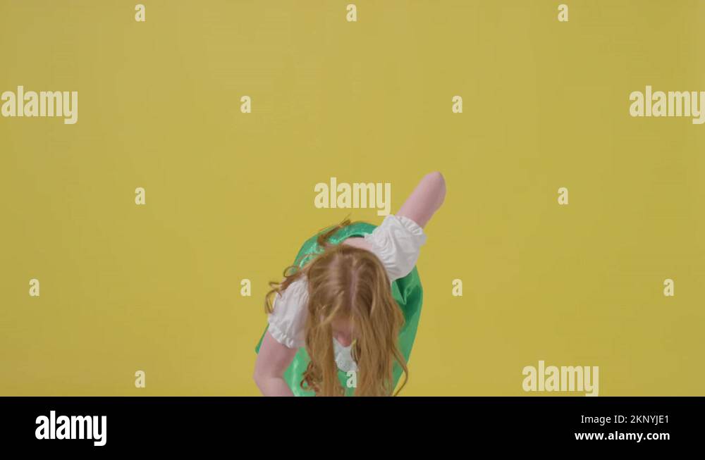 Mid Shot of Little Girl Bowing in a Costume Stock Video Footage - Alamy