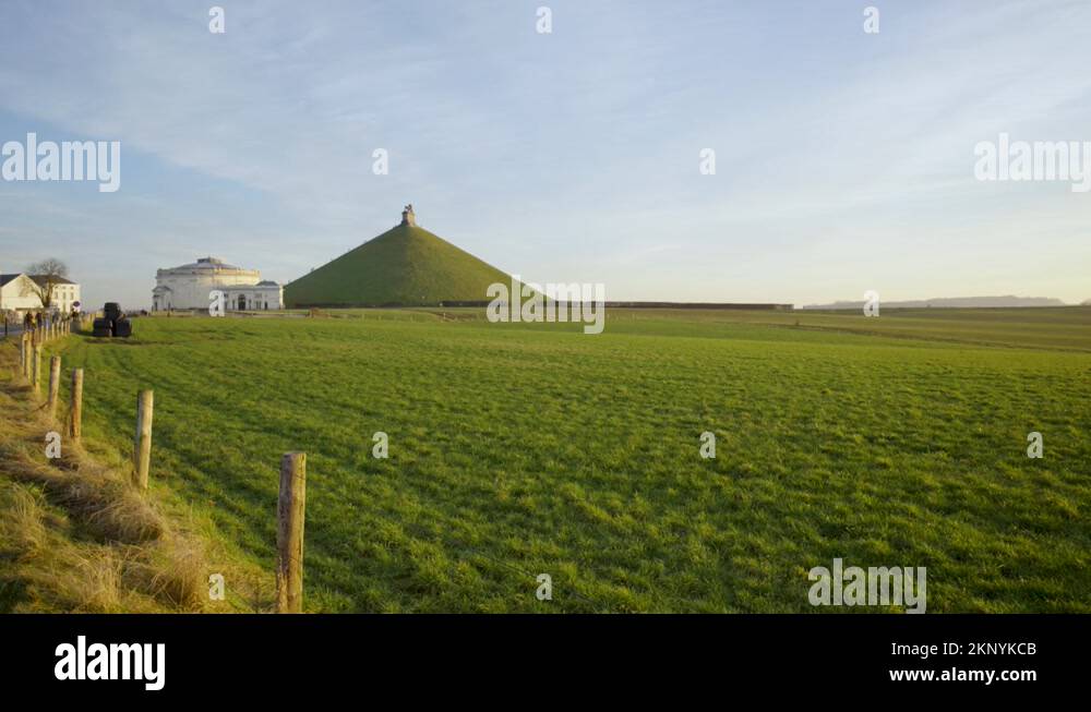 Wide angle of lion's mound around arable land and next to the museum of ...