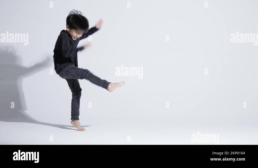 Asian boy practice dancing on the white screen Stock Video Footage - Alamy