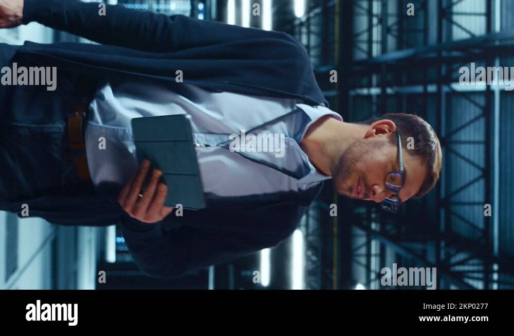 Vertical Screen IT Specialist Works in Data Center with Working Server ...