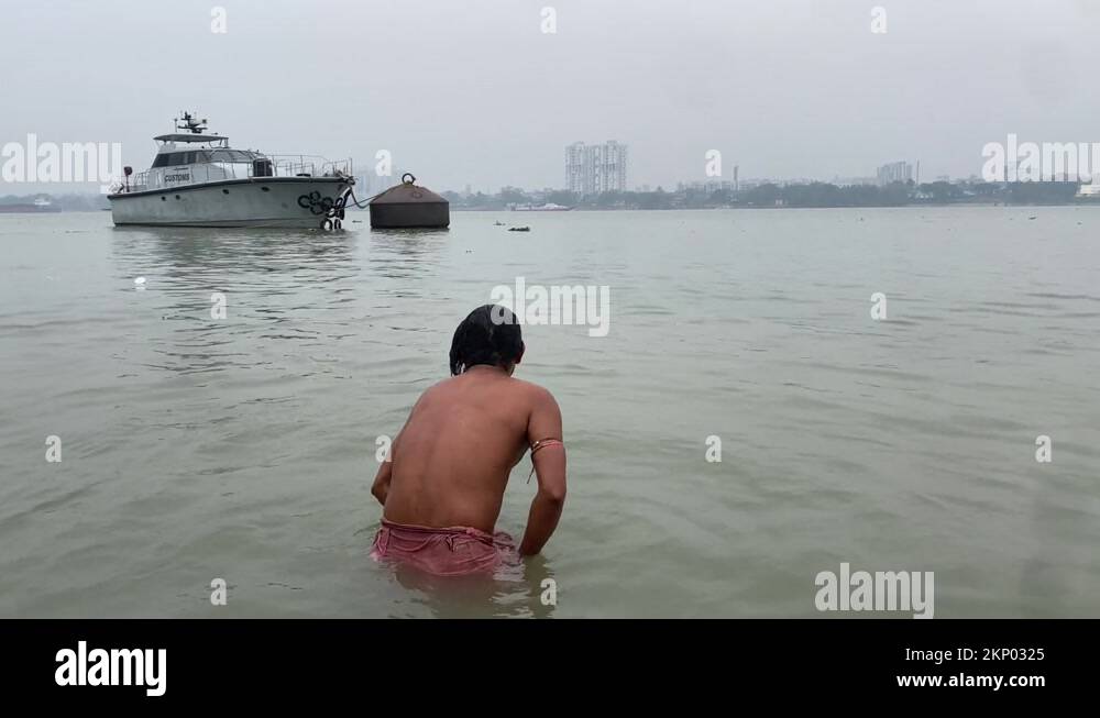 Dip in ganga river Stock Videos & Footage - HD and 4K Video Clips - Alamy