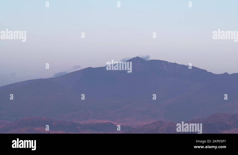 Long telephoto landscape view of Snowdon mountain in Snowdonia at blue ...