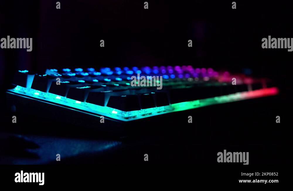 Mechanical Gaming RGB Keyboard lights up in the dark shot in 4k Stock ...