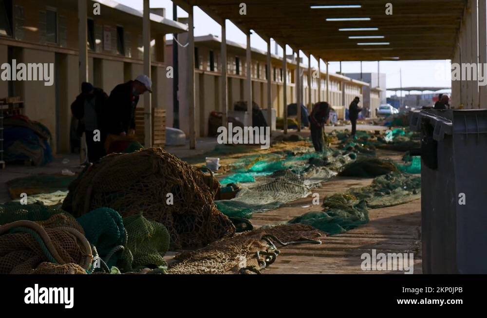 Fishing port men mending nets Stock Videos & Footage - HD and 4K Video ...