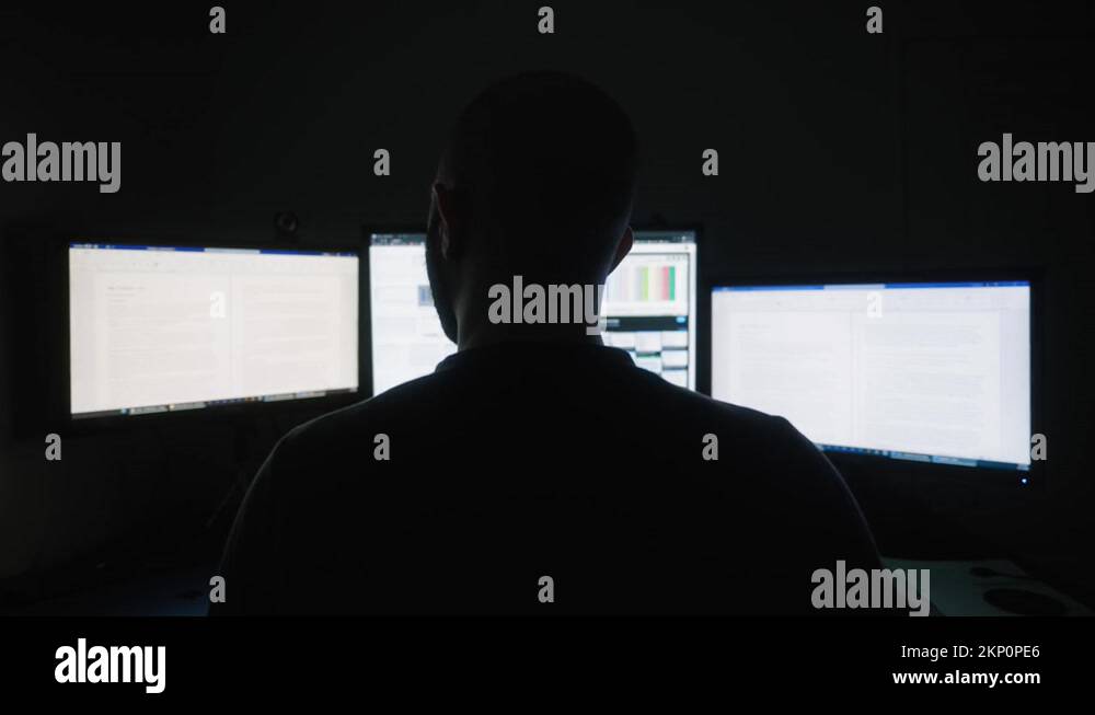 Man using computer three monitors Stock Videos & Footage - HD and 4K ...