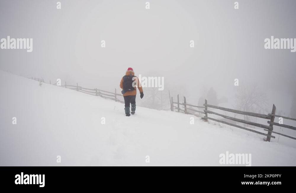 Tourist got into a very heavy snowfall and strong wind. extreme weather ...