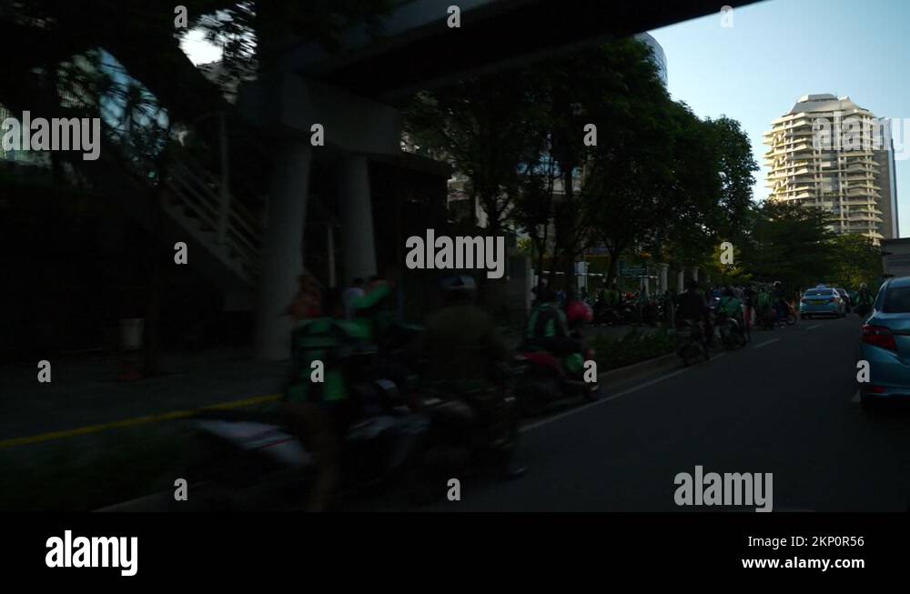 jakarta city center urban traffic street taxi road trip side pov 4k ... jakarta city center urban traffic street taxi road trip side pov 4k ...