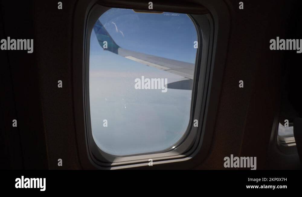 sunny day travel time aircraft window frame pov panorama 4k indonesia ...