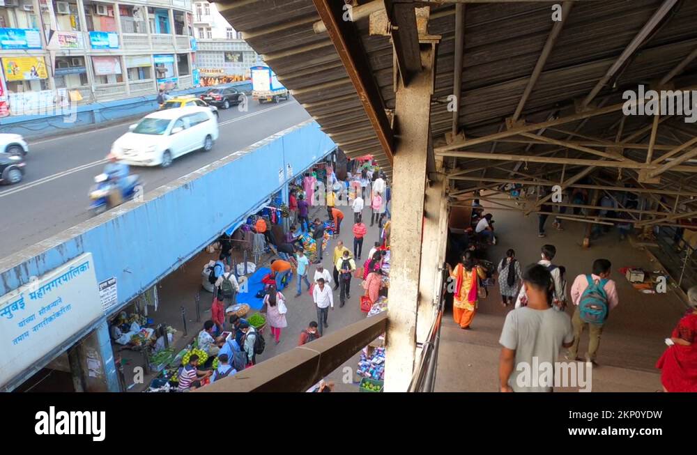 Real time view of people walking on a railway station bridge and ...
