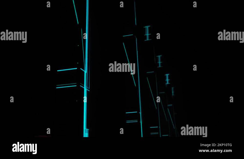 Colorful interactive LED wall show on columns in dark room - digital ...