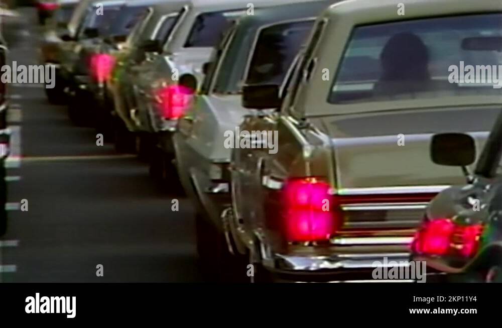 1970S ZOOM OUT ON DOWNTOWN PORTLAND STREETS IN RUSH HOUR Stock Video ...