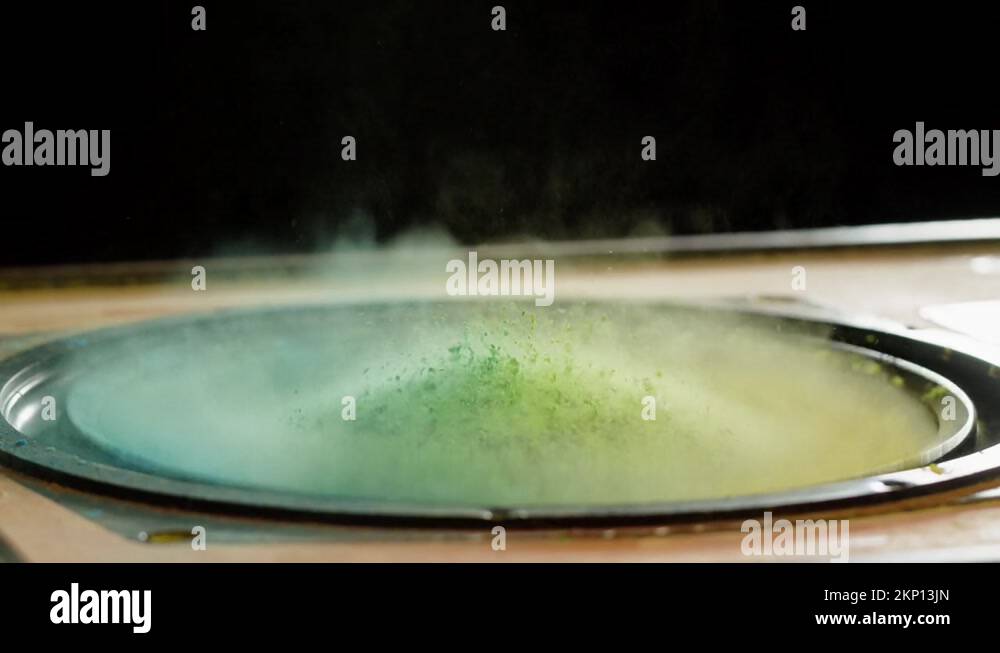 Acoustic sound system with yellow and blue paint powder. Loud music ...