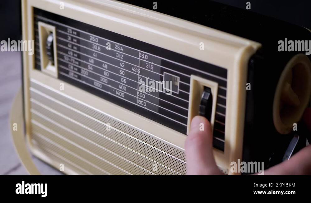 A Female Fingers Adjusting the Frequency on an Old Vintage Analog Receiver. 4K Stock Video ...
