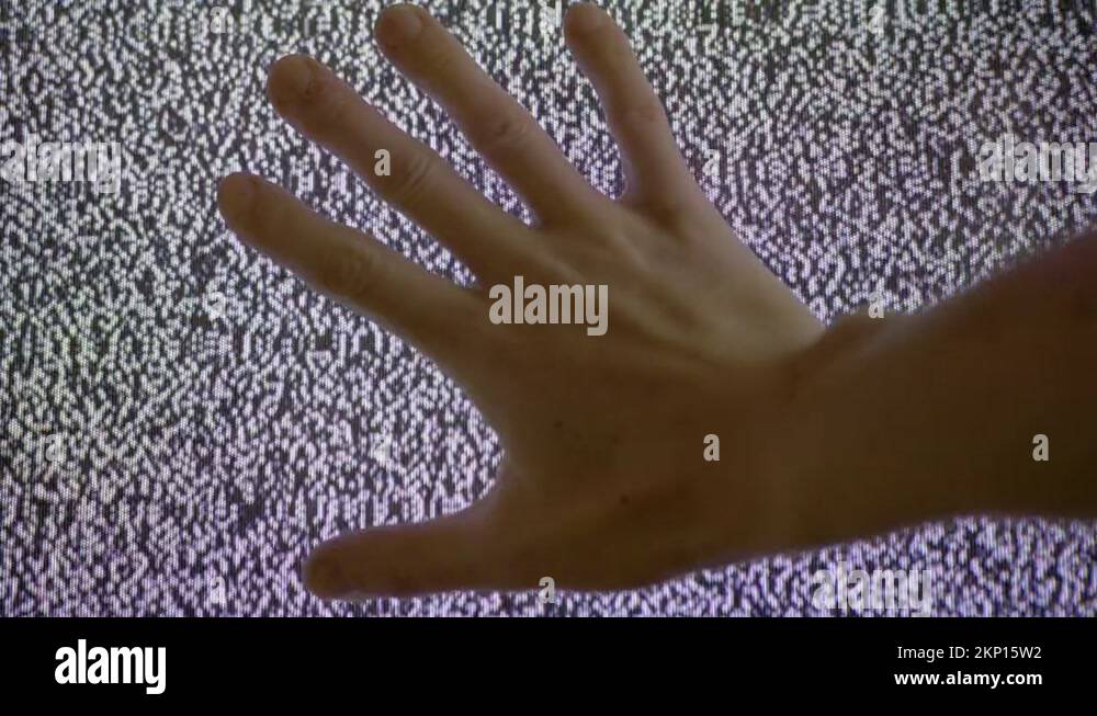 Hand Touches the Screen of the Old Retro TV on Which There is No Signal ...
