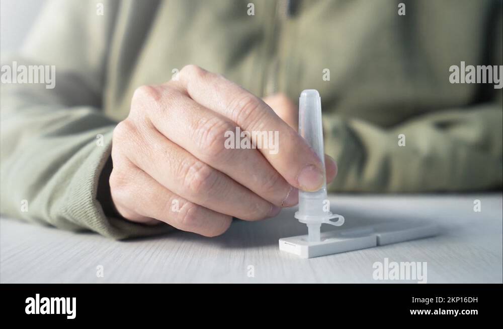 Person using sars cov 2 antigen testing card. Rapid diagnose home test ...