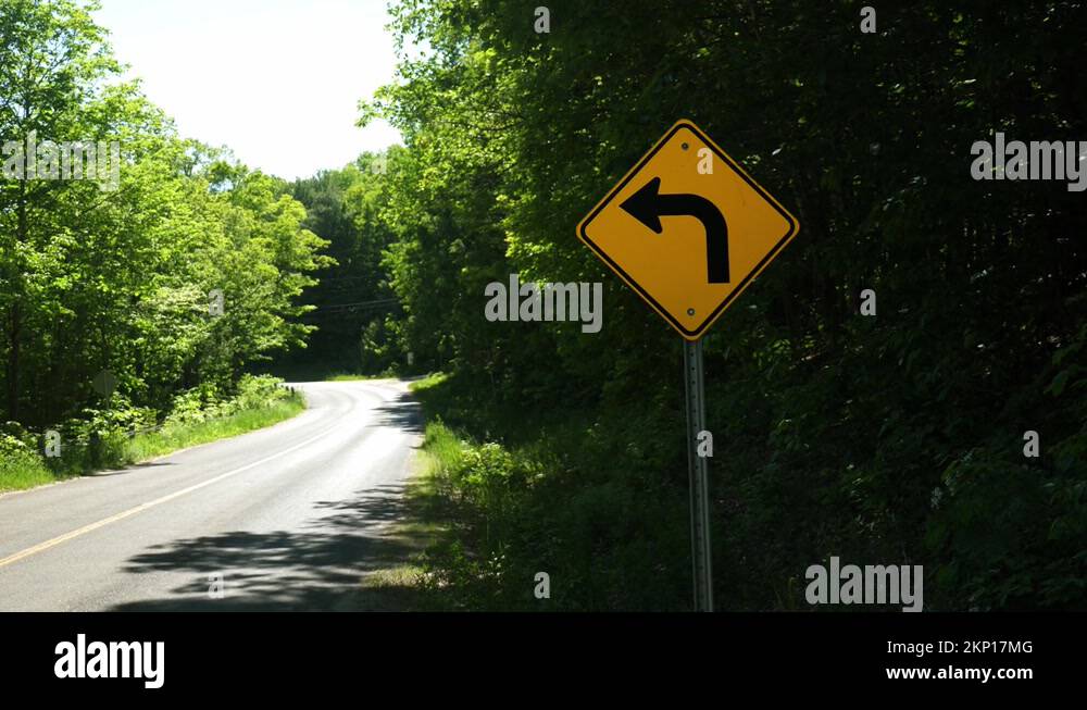 Road sign bend Stock Videos & Footage - HD and 4K Video Clips - Alamy