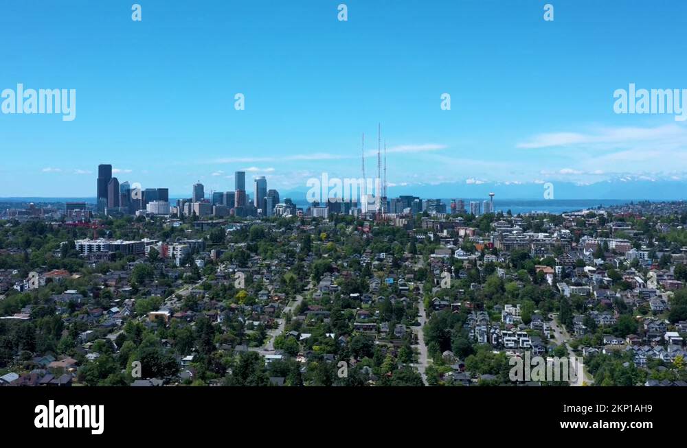 Drone flying high in the sky over Madrona Neighborhood in Seattle ...