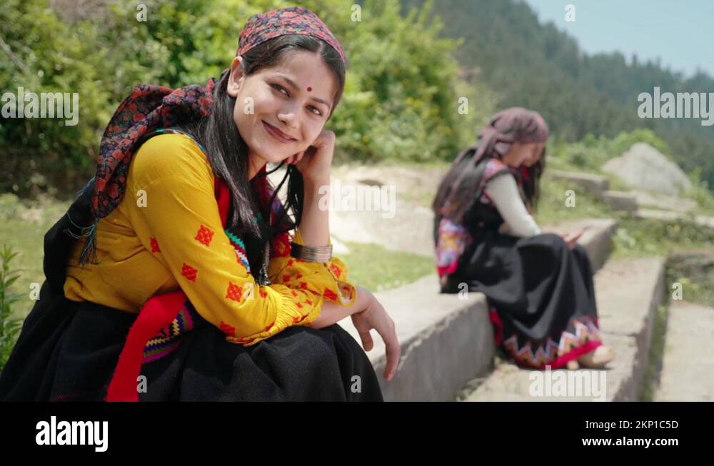 Young Indian beautiful Rural Woman in traditional attire in remote area ...