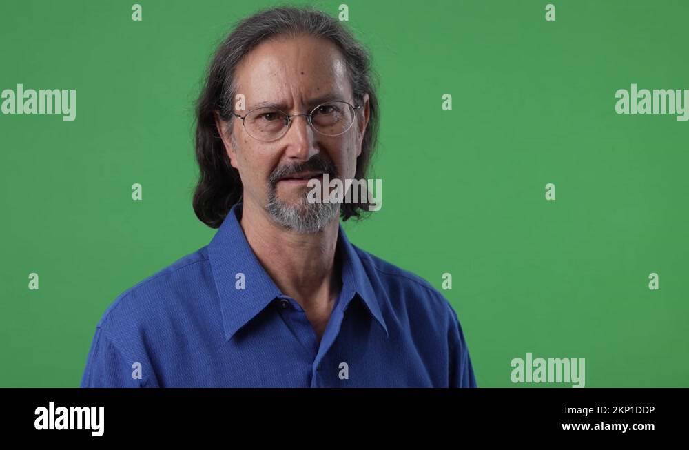 Portrait of mature man smiling happy face on green screen chroma key ...