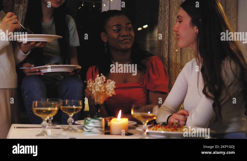 Women reunion conversation laughing. Young pretty multiethnic friends ...