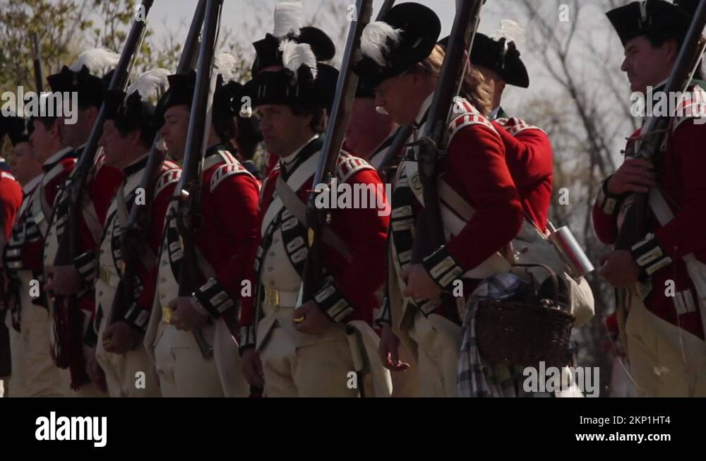 British Redcoat Re-enactor Soldiers armed with flintlock muskets - at ...