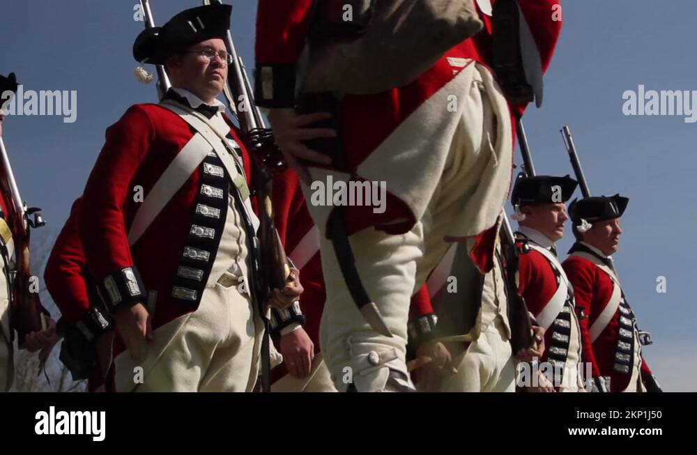 British Redcoat Re-enactor Soldiers armed with flintlock muskets, March ...