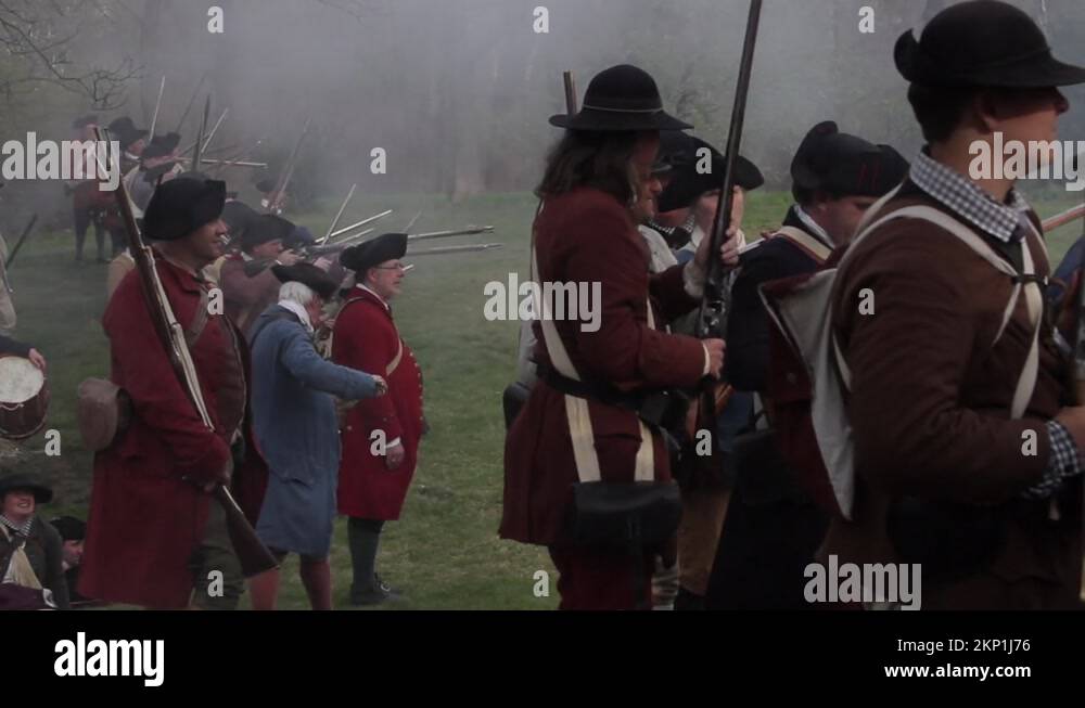 American Minutemen/Militia fight and FIRE muskets on Battle Road (1775 Stock Video Footage - Alamy
