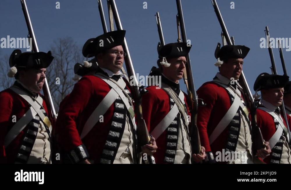 British Redcoat Re-enactor Soldiers armed with flintlock muskets, March ...