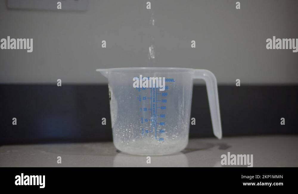 Pouring liquid jug Stock Videos & Footage - HD and 4K Video Clips - Alamy