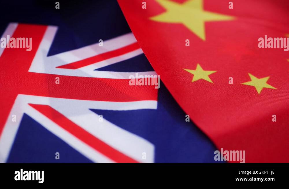 Chinese and British Union Jack flag background Stock Video Footage - Alamy