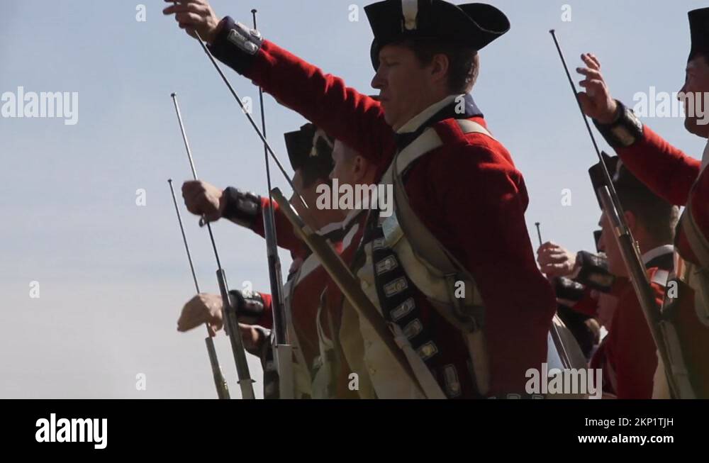 British Redcoat Re-enactor Soldiers armed with flintlock muskets ...
