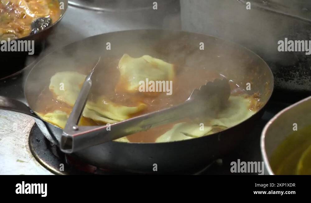 Stovetop pans Stock Videos & Footage - HD and 4K Video Clips - Alamy
