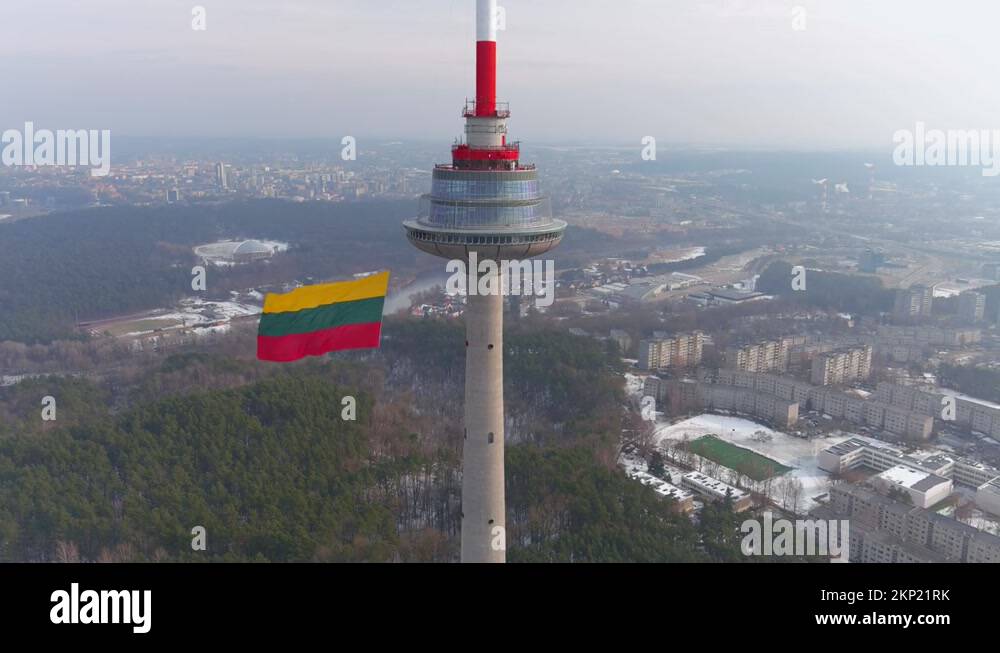 Giant tricolor Lithuanian flag waving on Vilnius television tower in ...