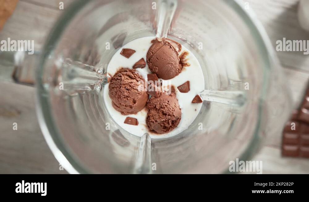 Chocolate Ice Cream Milkshake Mixed in Blender - Top View, Camera Moves ...