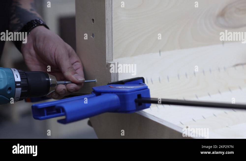 Process of connecting the parts of the furniture frame using a cordless ...