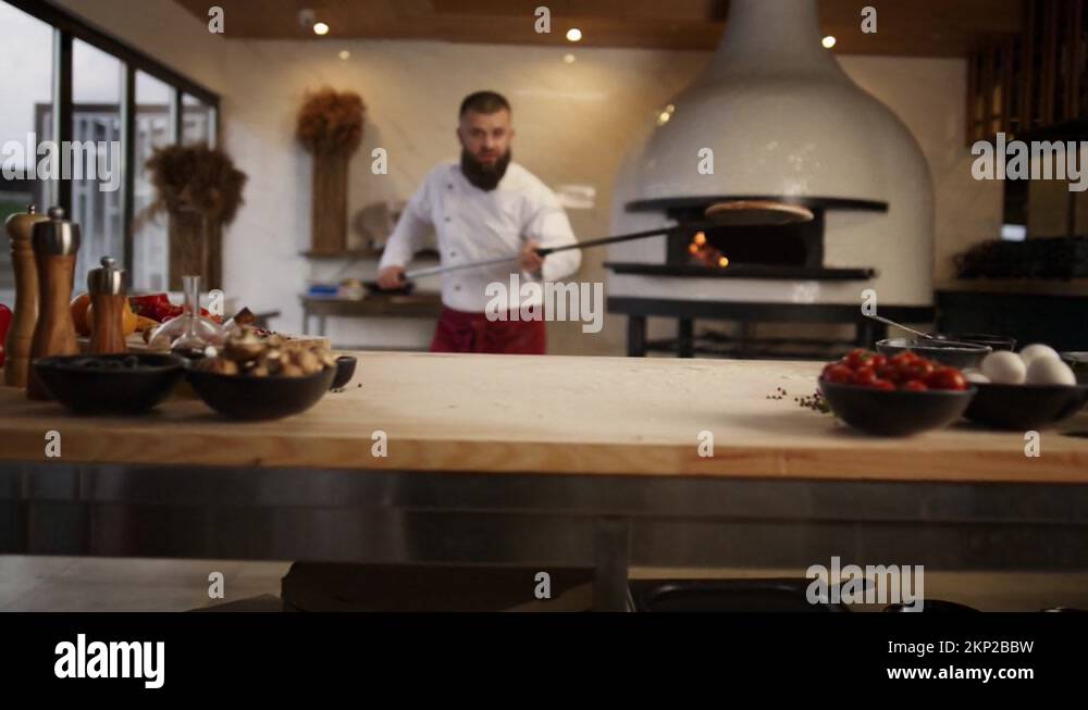 Man cooking pizza Stock Videos & Footage - HD and 4K Video Clips - Alamy