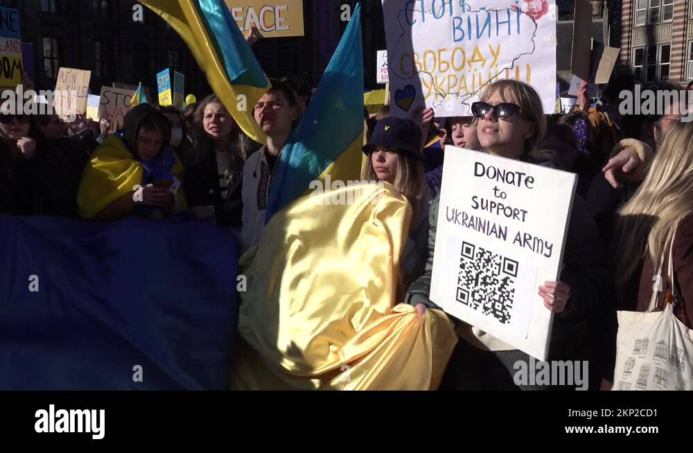 People chant slogans during anti-war rally Amsterdam, solidarity ...