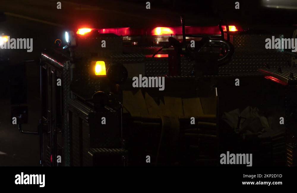 Flashing Emergency Lights from the Back of a Fire Truck at Night Stock ...