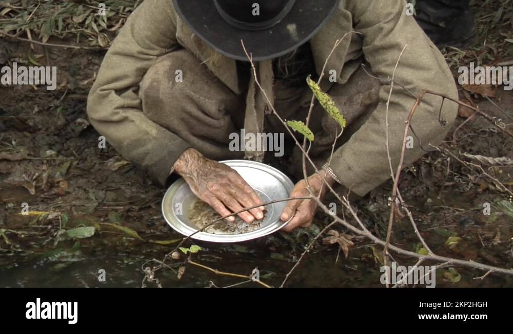 Gold Miner Panning for Gold in California River - Circa 1849 Stock ...