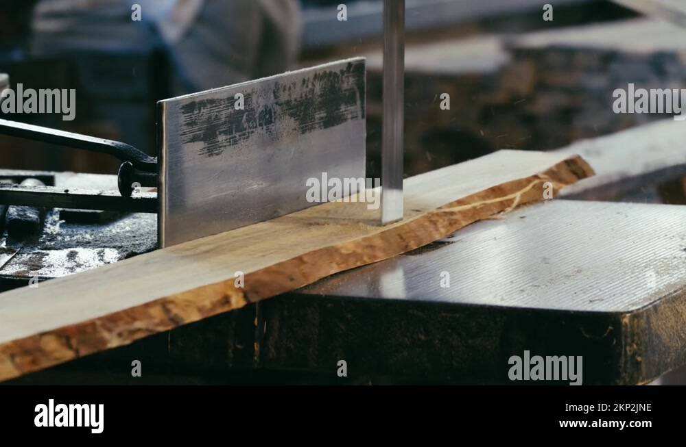 sawmill cutting. Processing and sawing timber at a sawmill. Industrial ...