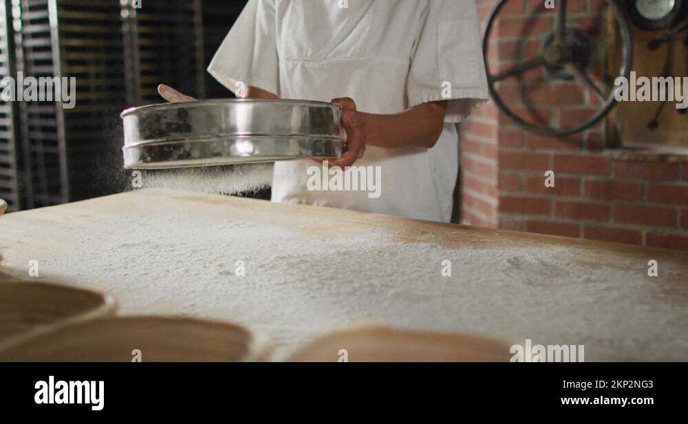 Female baker sieving flour Stock Videos & Footage - HD and 4K Video ...