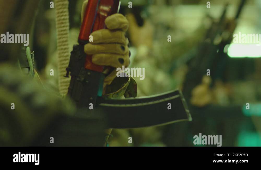 Group of Soldiers or Special Forces Loading Weapons and Preparing ...