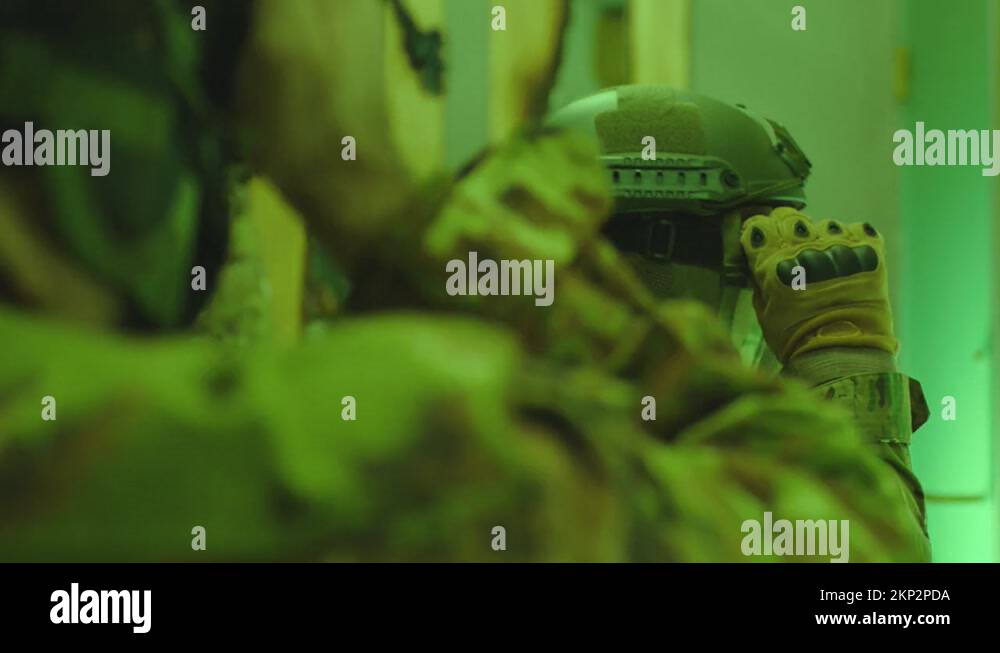 Group Of Soldiers Or Special Forces In Military Locker Room Wearing