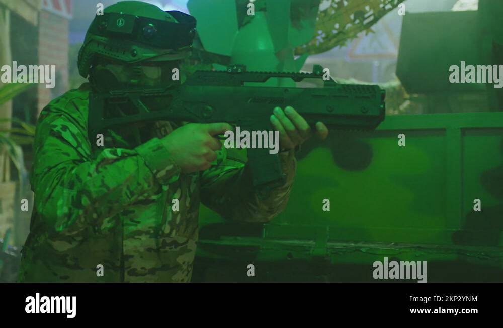 Side view of special force soldier or laser tag player . Swat man with ...