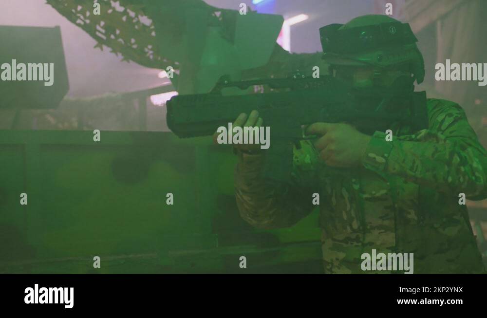 Side view of special force soldier or laser tag player . Swat man with ...